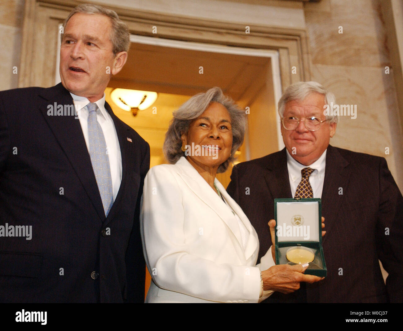 President George W. Bush, left, and Speaker of the House Dennis Hastert ...