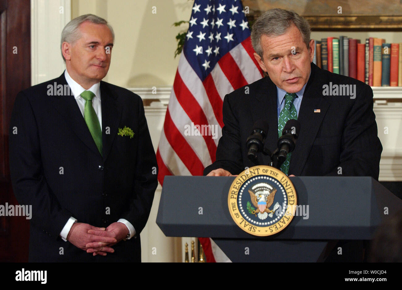U.S. President George W. Bush speaks after receiving a shamrock from ...