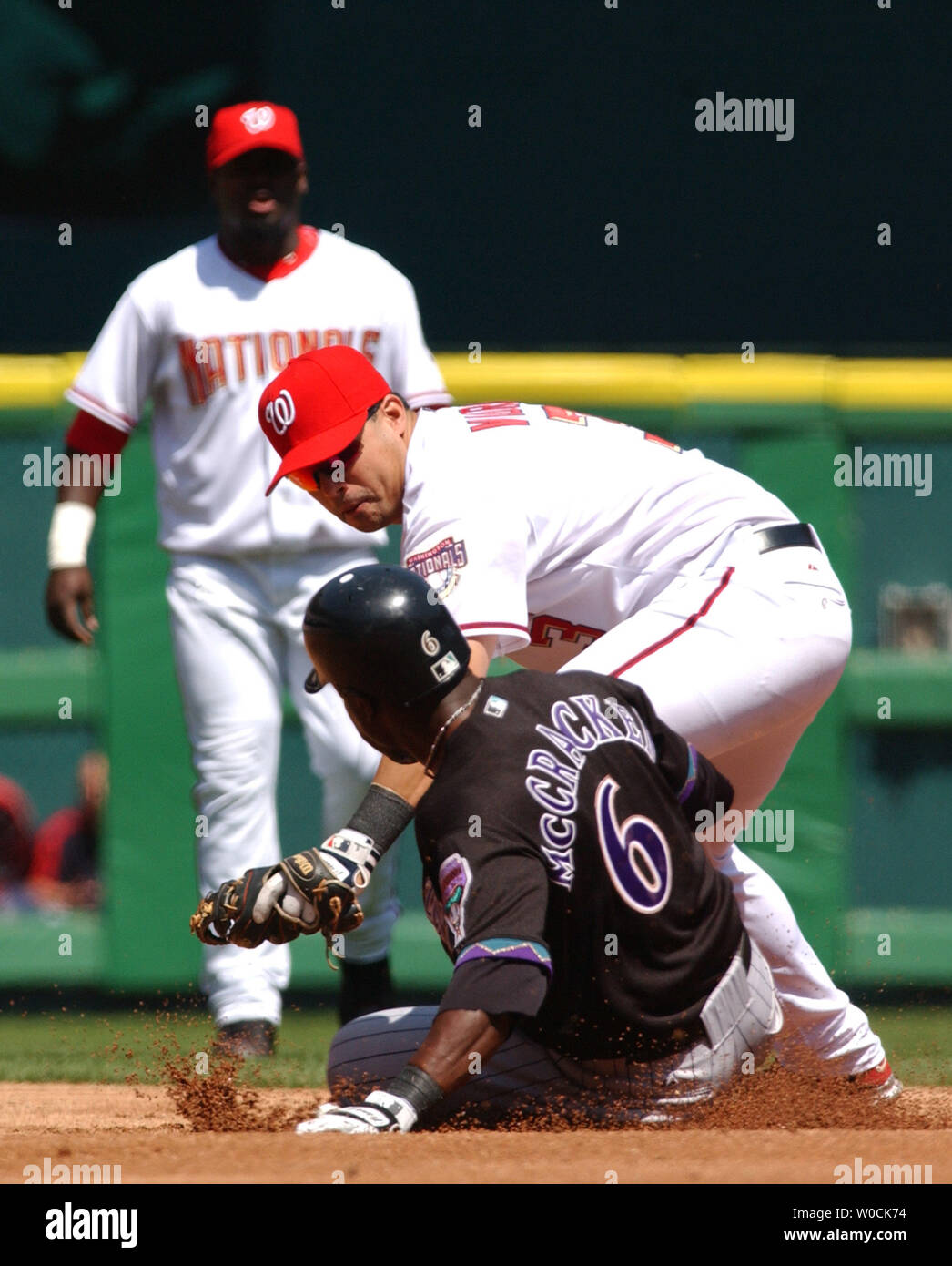 Washington Nationals second baseman Jose Vidro tags out Arizona ...