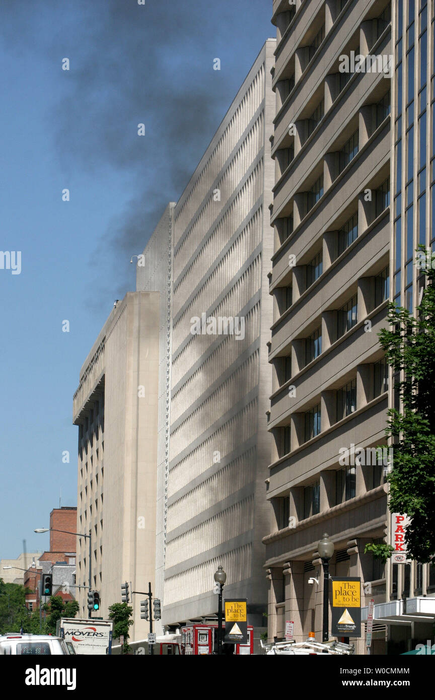 Smoke billows from an underground transformer fire outside the main ...