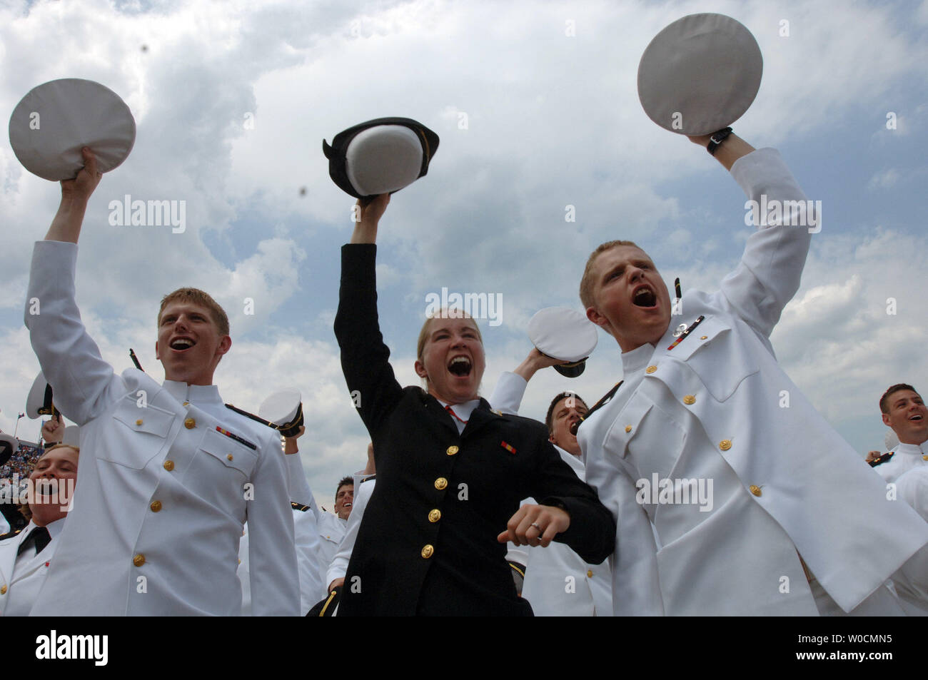 U.S. Naval Academy graduates Travis Hartman, Sarah Coulthard and ...