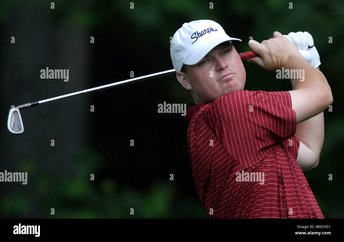 Chad Campbell watches his ball after driving it off of the 12th hole ...