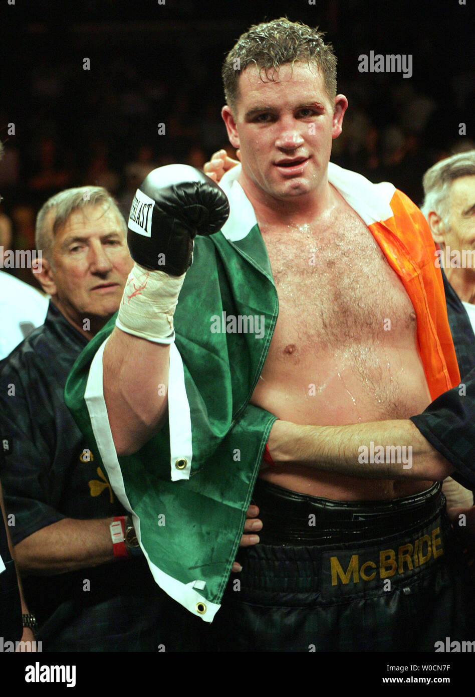 Kevin McBride of Clones, Ireland, and one of his corner men celebrate ...