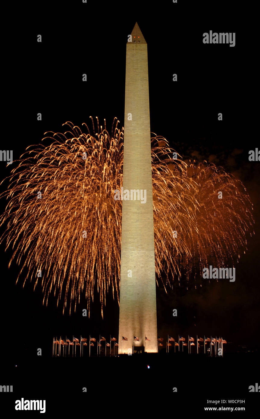 Fireworks explode near the Washington Monument during the 4th of July ...
