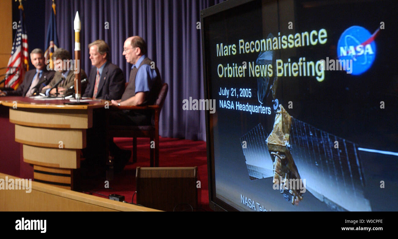A group of NASA scientists holds a news conference to discuss the ...