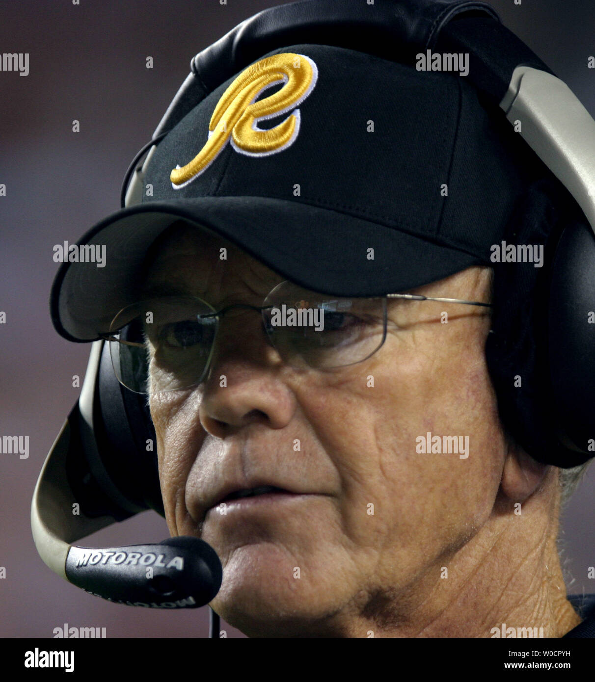 Joe Gibbs, Head Coach of the Washington Redskins, coaches against the ...