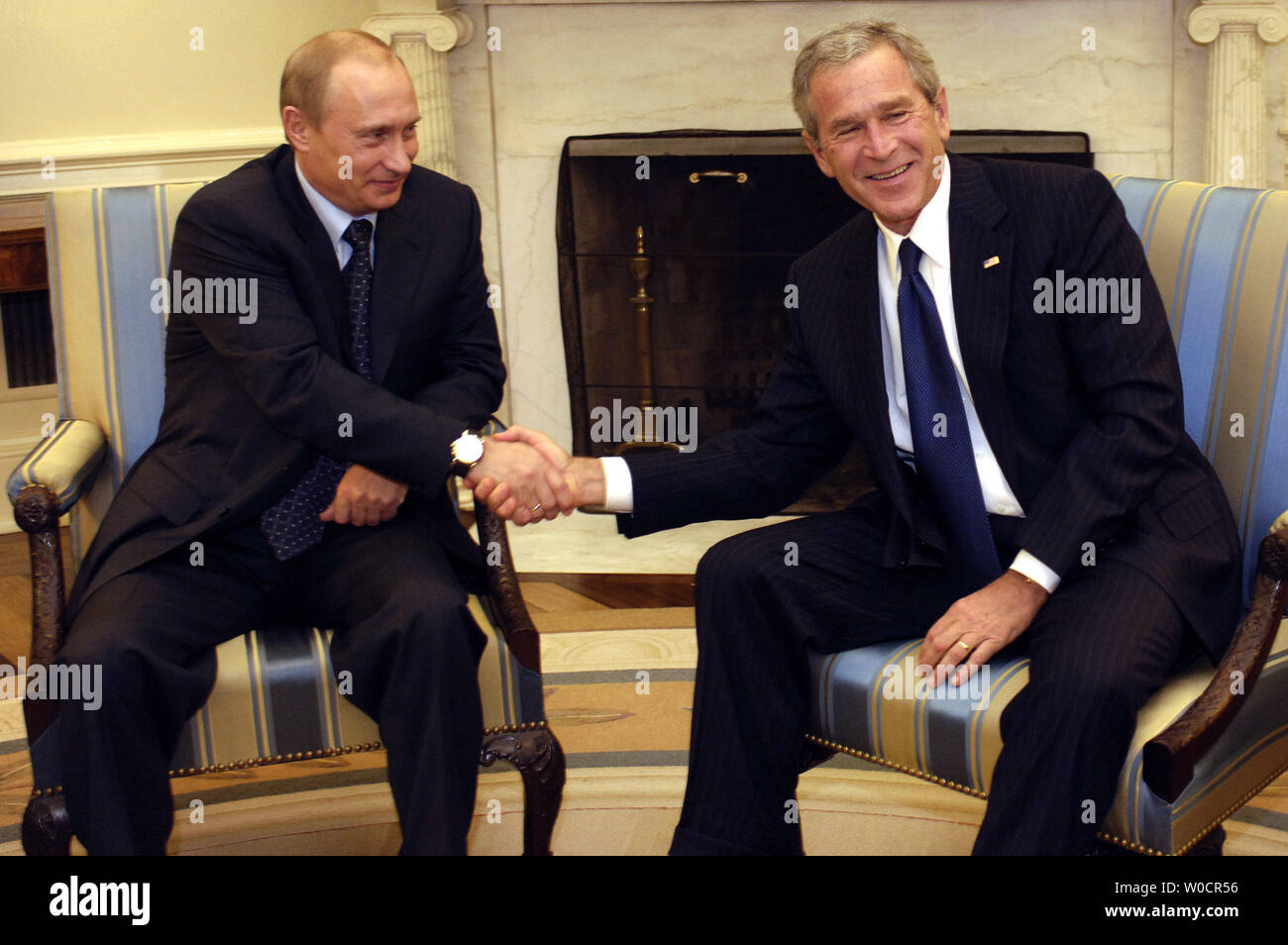President George W. Bush meets with Russian President Vladimir Putin in ...