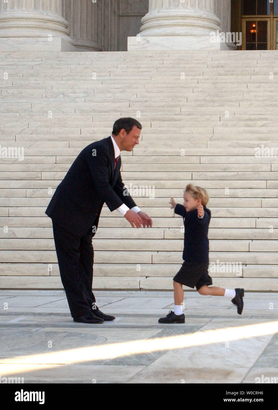 Chief Justice John G. Roberts goes to hug his son Jack on the front ...
