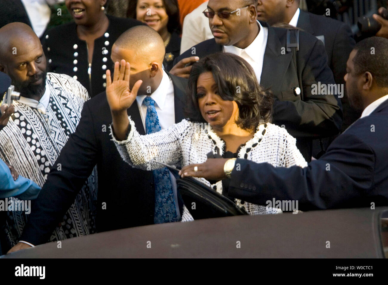 U.S. television talk show host Oprah Winfrey waves after attending the ...