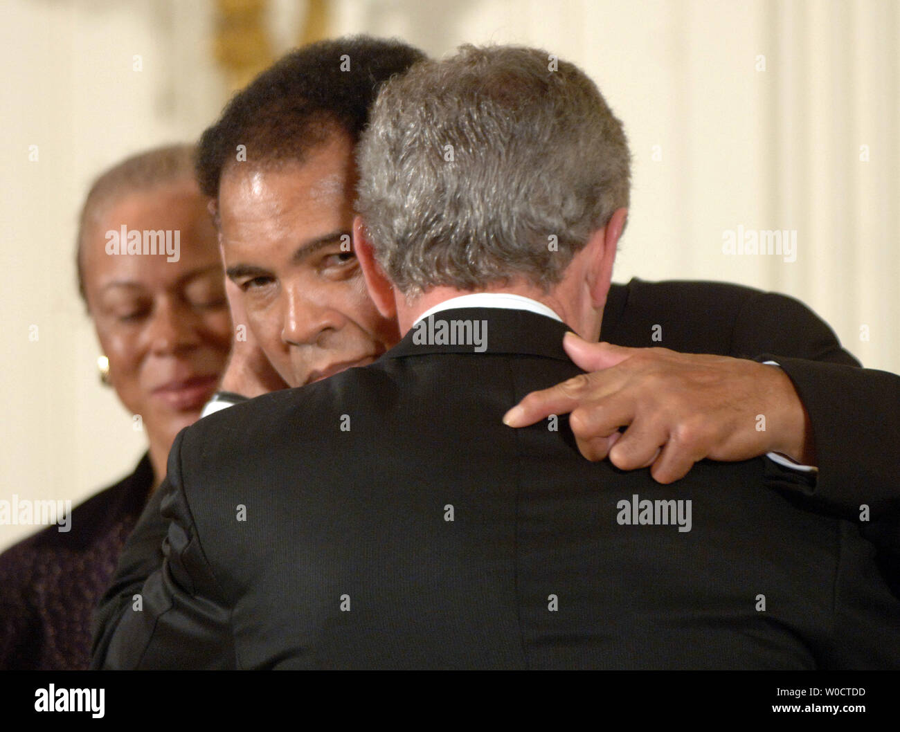 U.S. President George W. Bush hugs boxing legend Muhmmad Ali after Bush ...