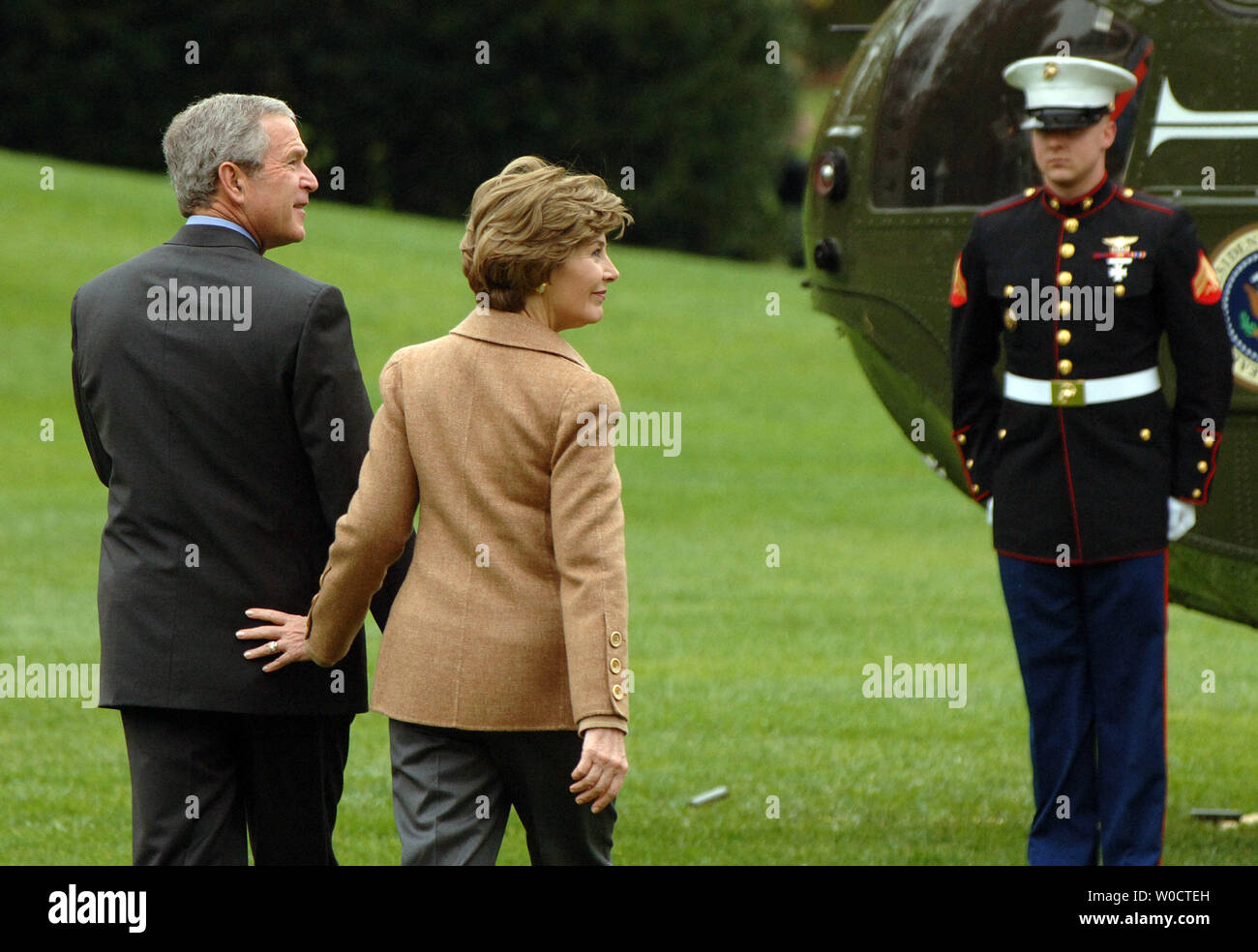 U.S. President George W. Bush and First Lady Laura Bush depart from the ...