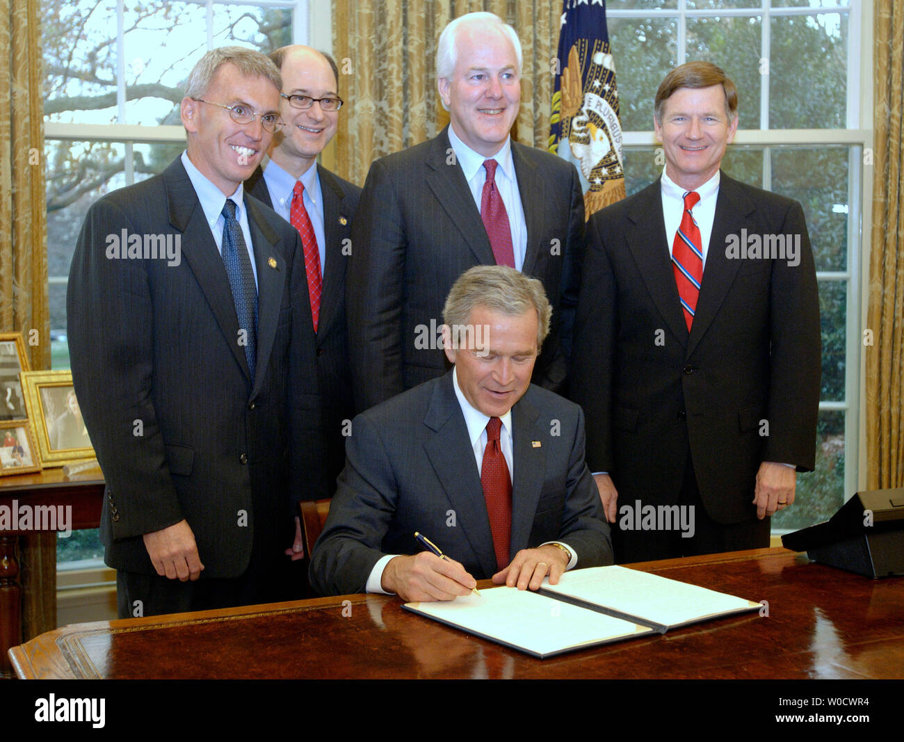 President George W. Bush (C) is joined by, from the left, Rep. Todd ...