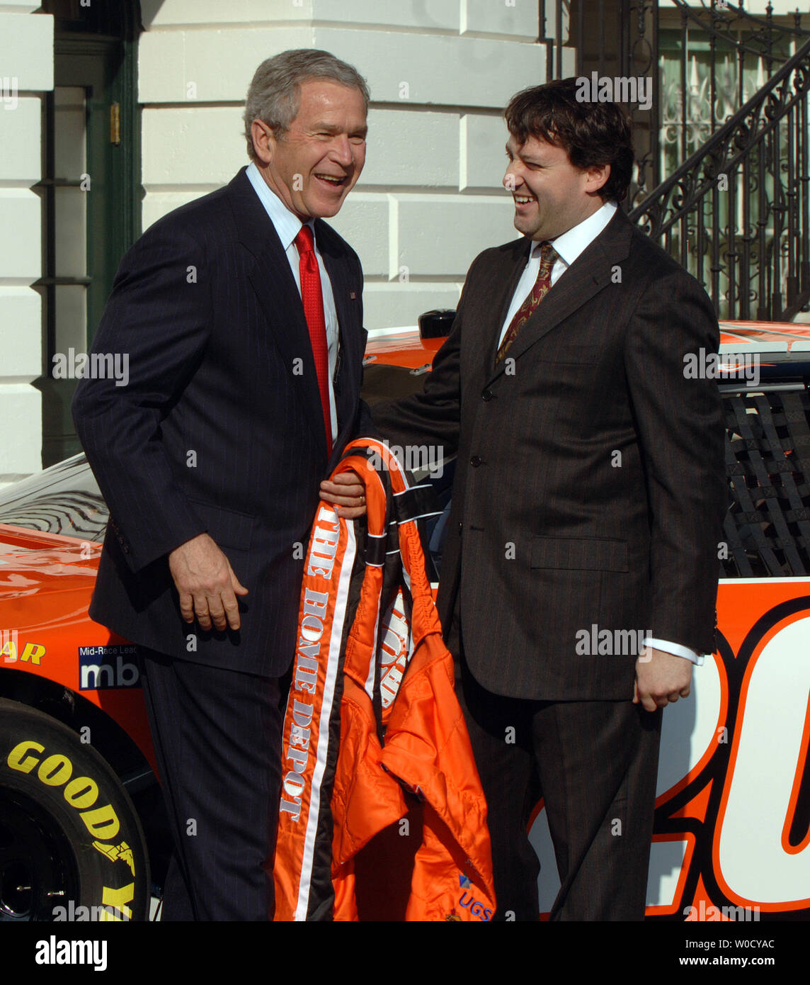 U.S. President George W. Bush shares a laugh with 2005 NASCAR Nextel ...