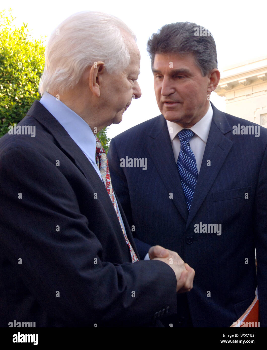 Sen. Robert Byrd, D-W.Va., shakes hands with W.Va. Gov. Joe Manchin ...
