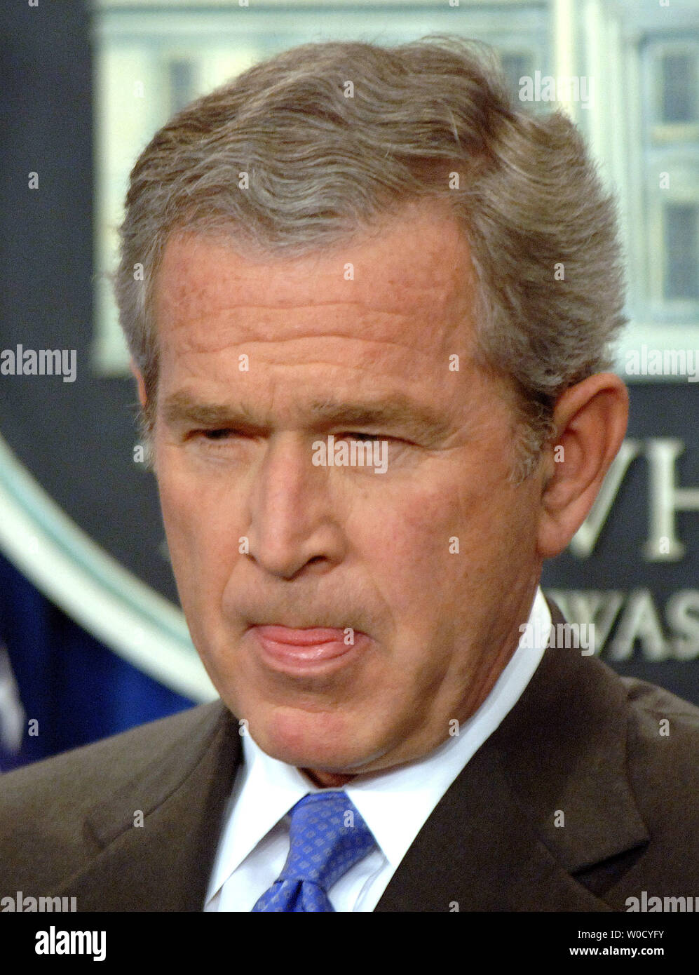 U.S. President George W. Bush speaks to the press during a news ...