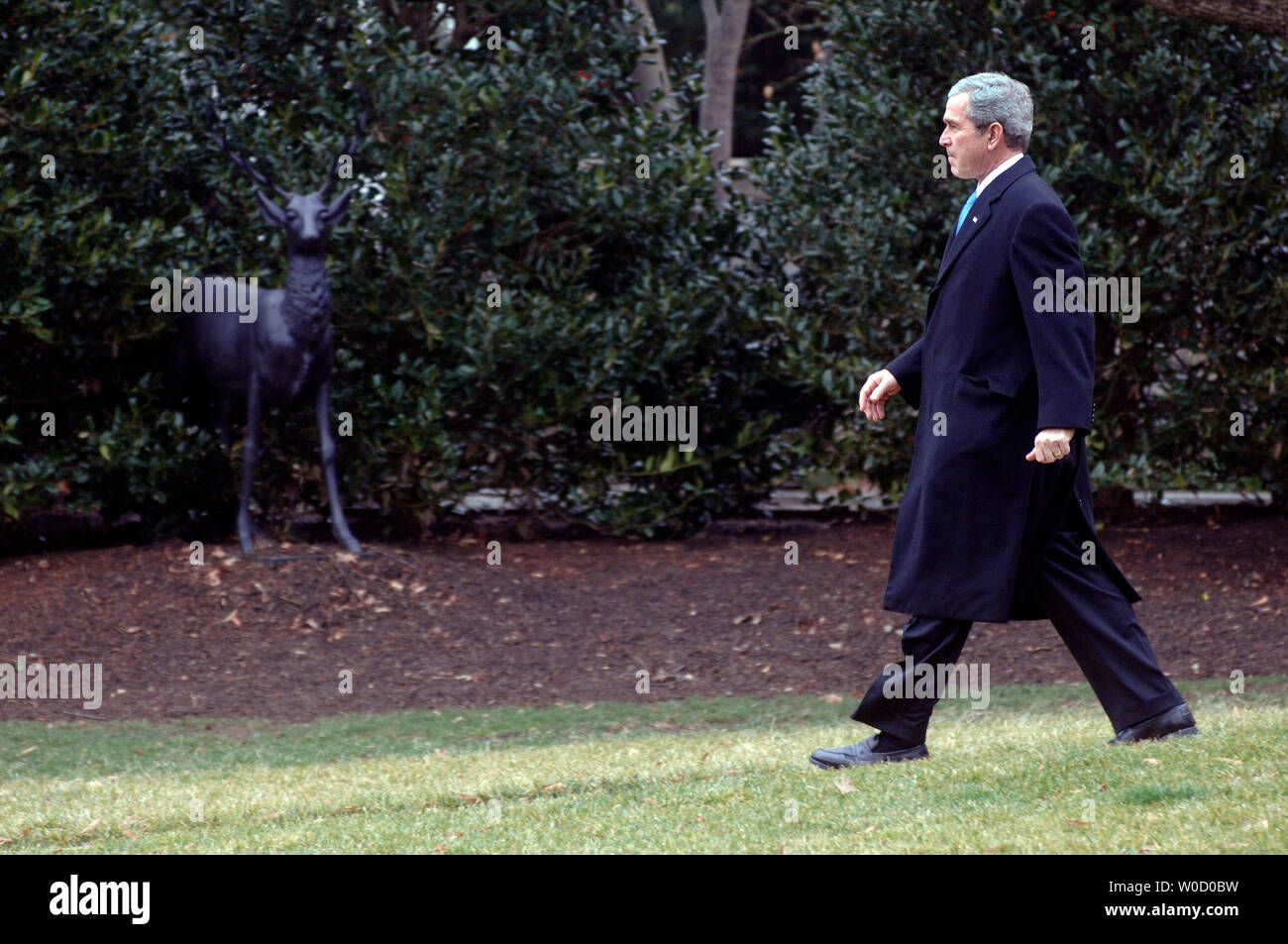 President George W. Bush makes his way to Marine One as he departs for ...