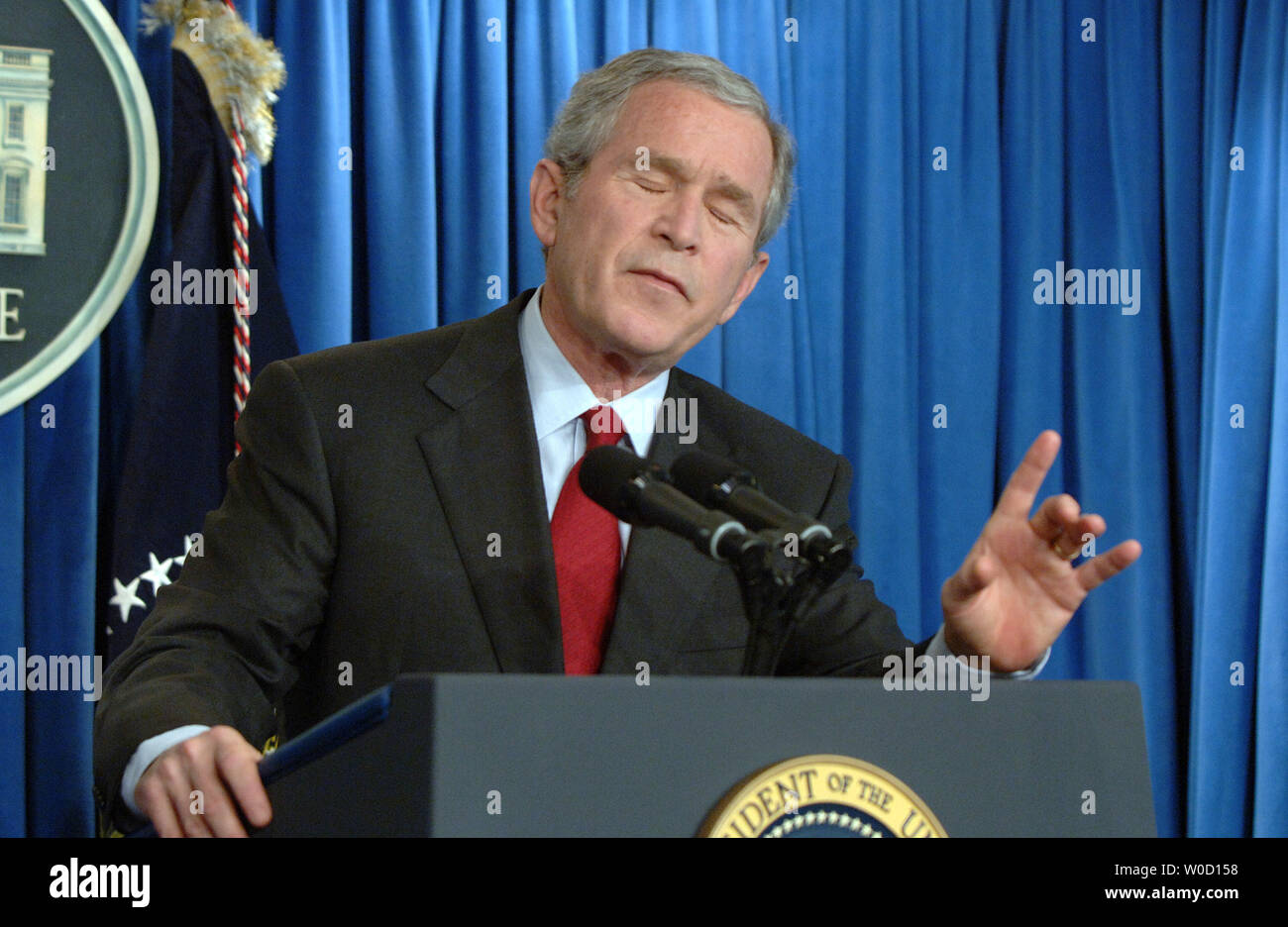 U.S. President George W. Bush answers questions from reporters during a ...