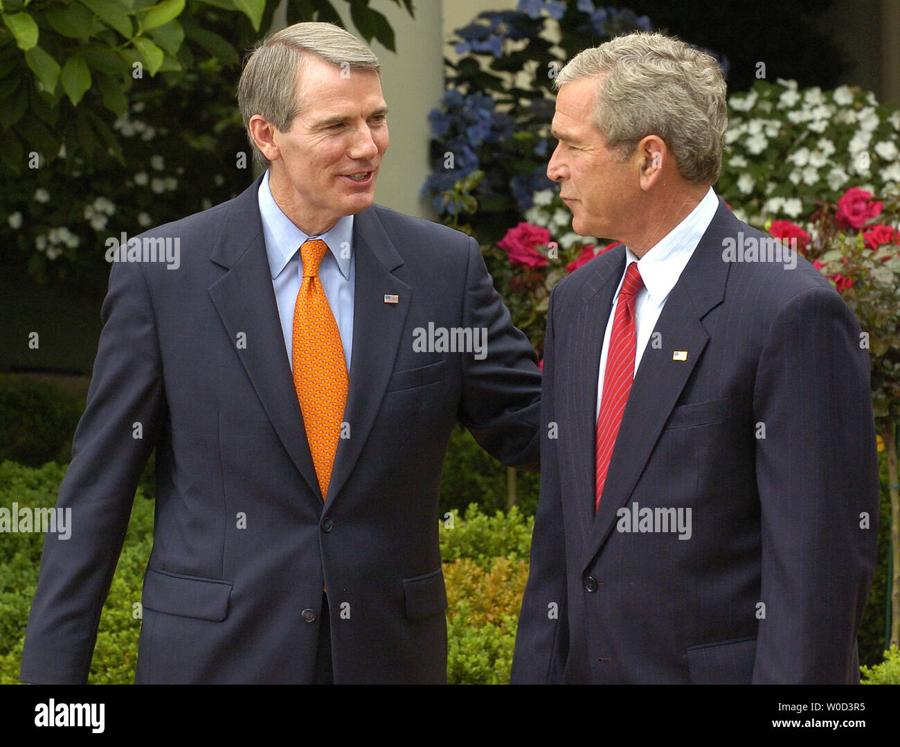 US President George W. Bush (R) attends the swearing-in ceremony for ...