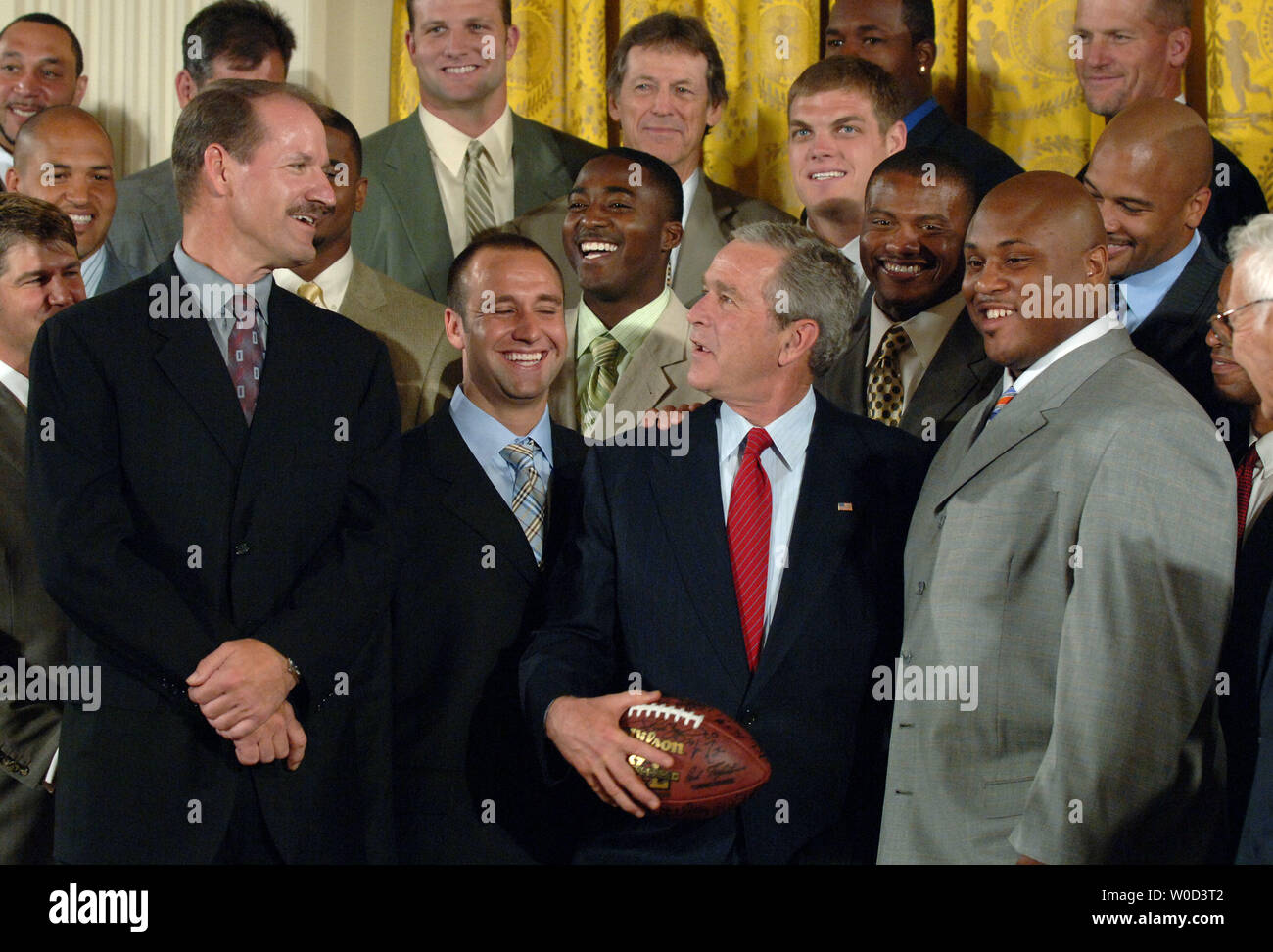 U.S. President George W. Bush stands next to Pittsburgh Steelers Casey ...