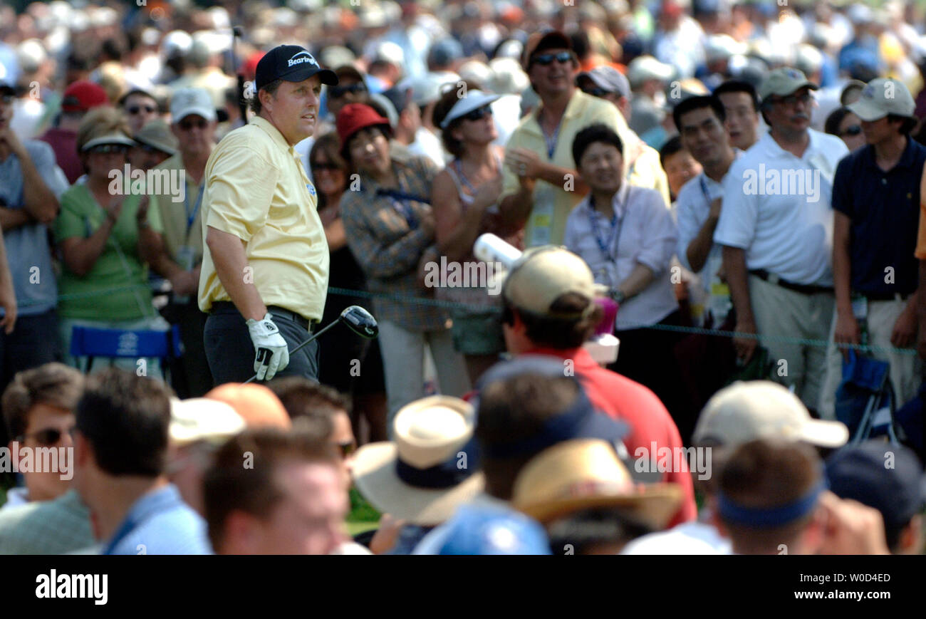 Phil Mickelson watches his drive off of the fourth tee box, during the ...
