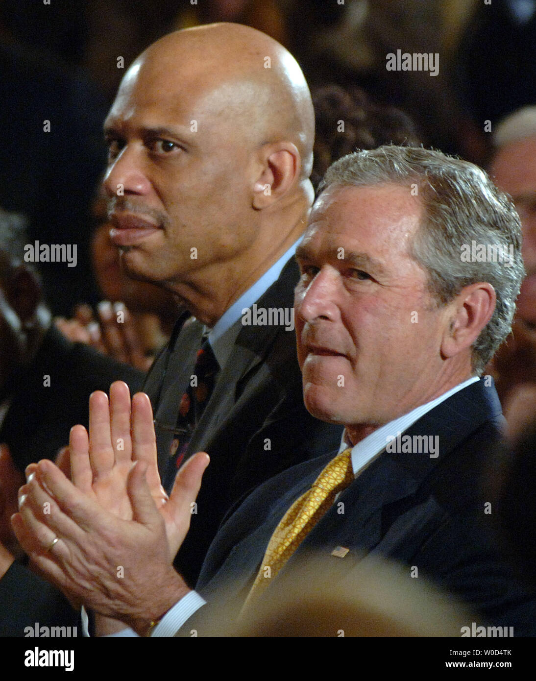 Kareem Abdul-Jabbar and U.S. President George W. Bush applaud as B.B ...