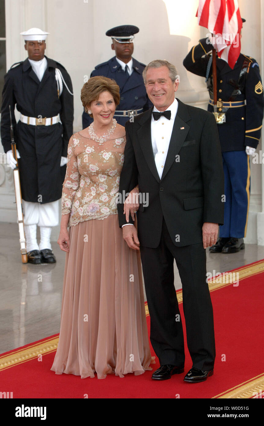 First Lady Laura Bush and U.S. President George W. Bush arrive to ...