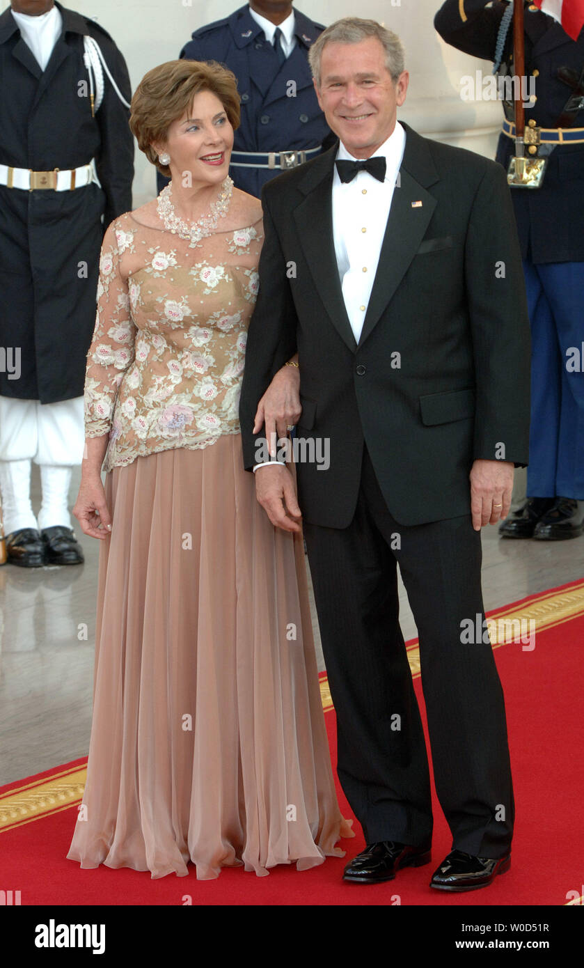 First Lady Laura Bush and U.S. President George W. Bush arrive to ...