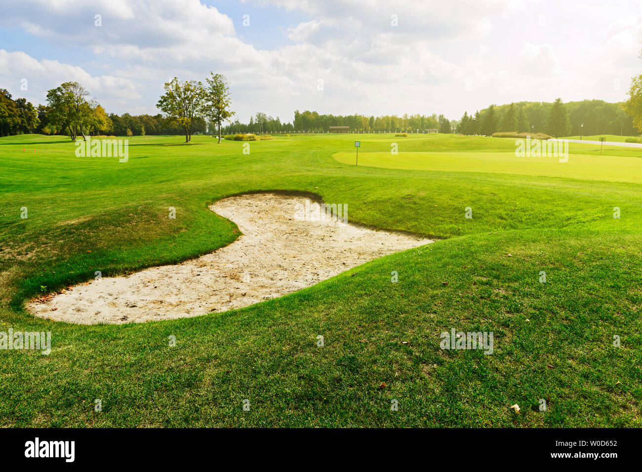 Golf course with sand bunkers - beautiful landscape Stock Photo - Alamy