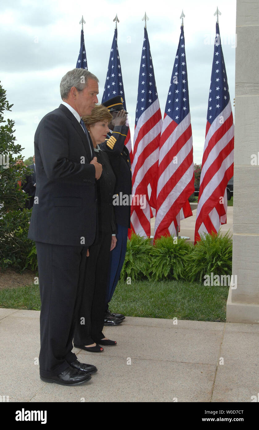 U.S. President George W. Bush and First Lady Laura Bush participate in ...