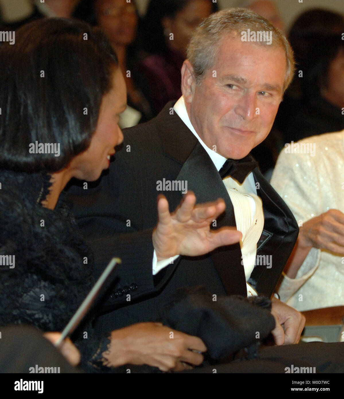 U.S. President George W. Bush greets Secretary of State Condoleezza ...