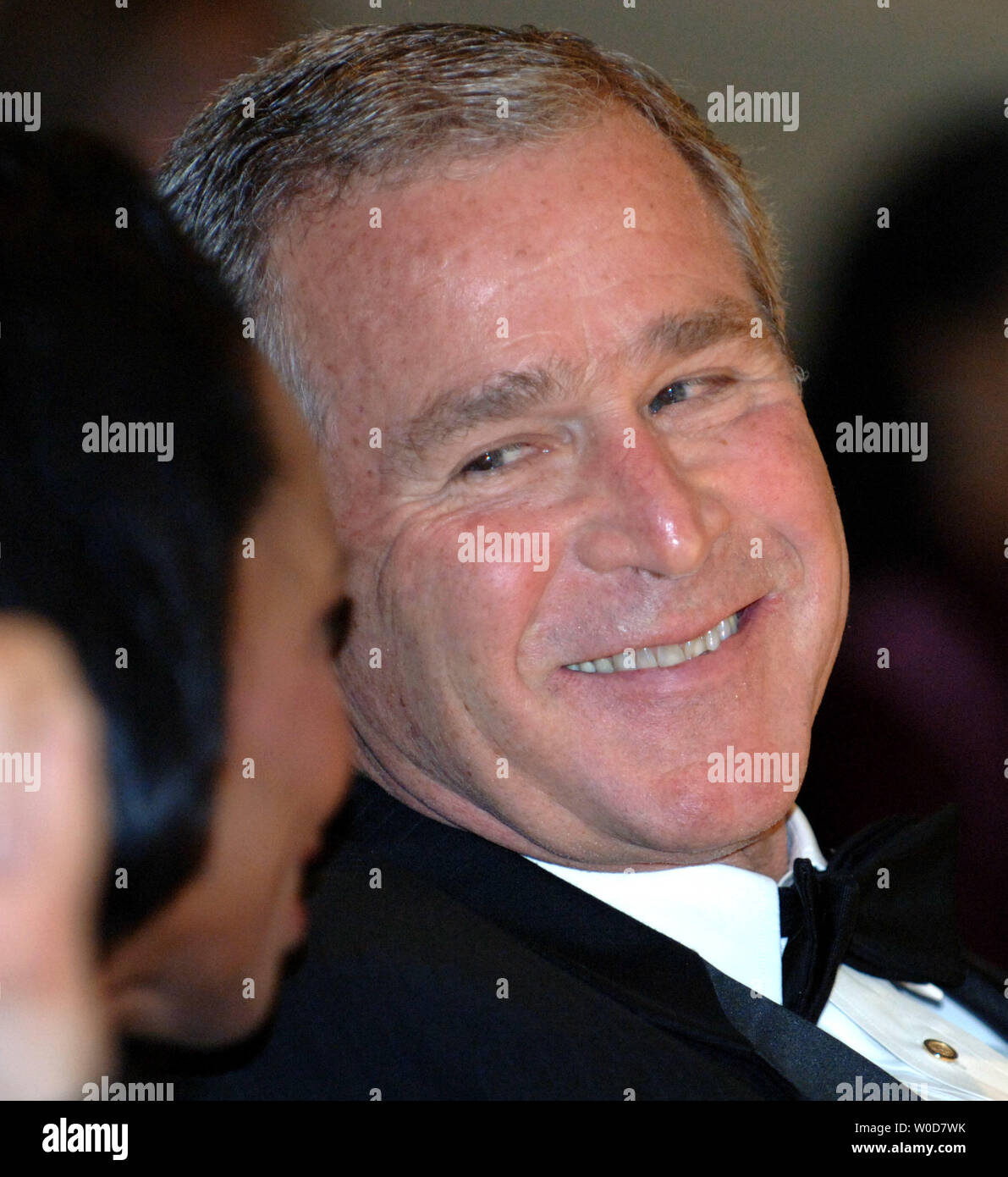 U.S. President George W. Bush greets Secretary of State Condoleezza ...
