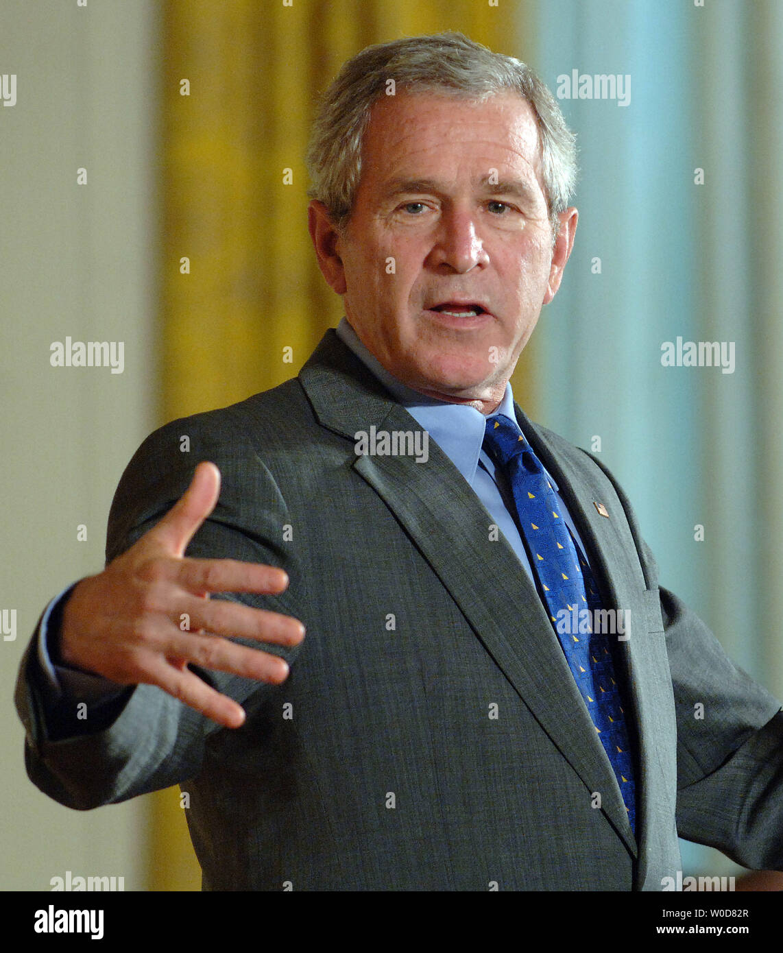 U.S. President George W. Bush speaks to Spanish Crown Prince Felipe and ...