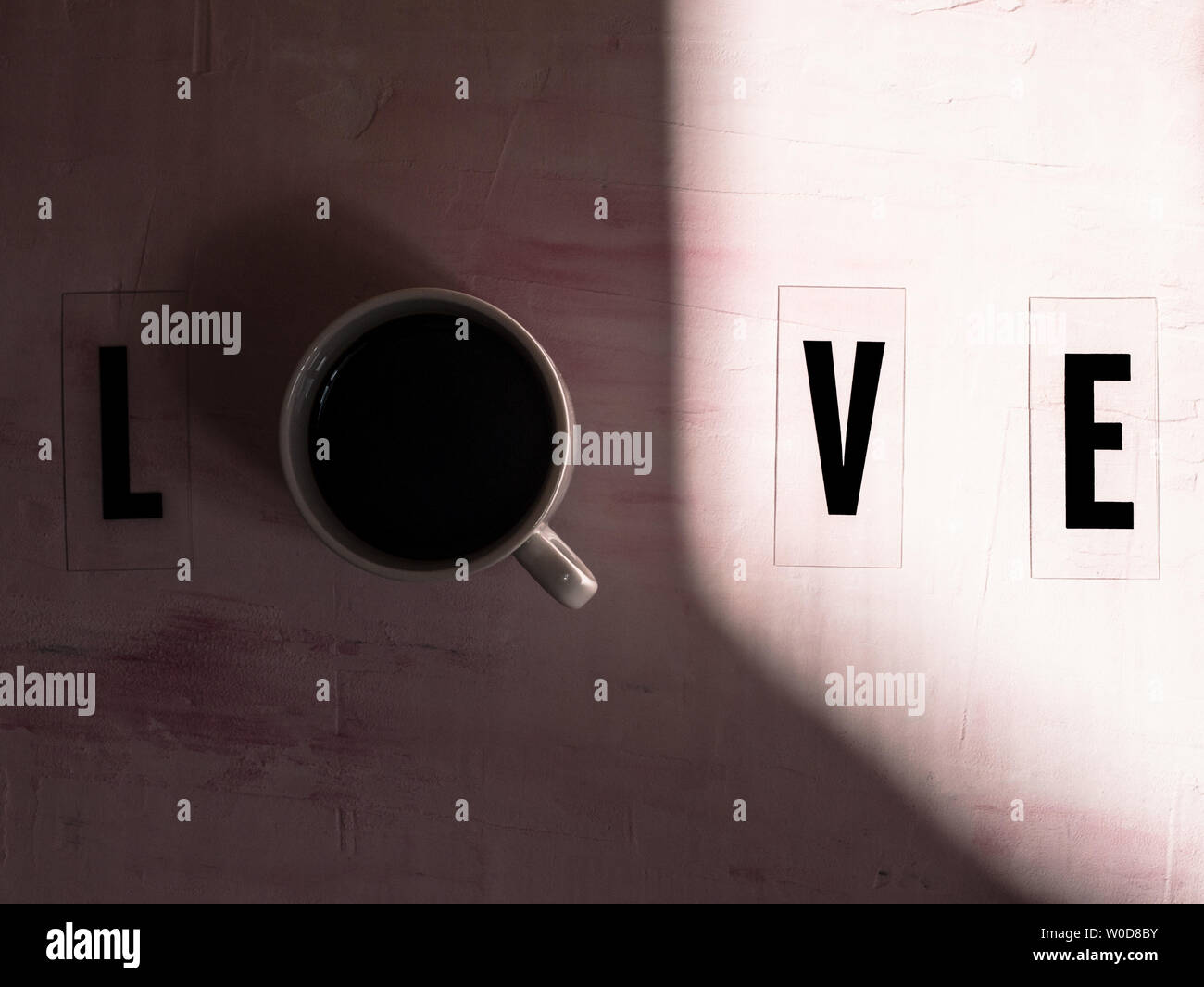 Word LOVE with cup of coffee Stock Photo - Alamy