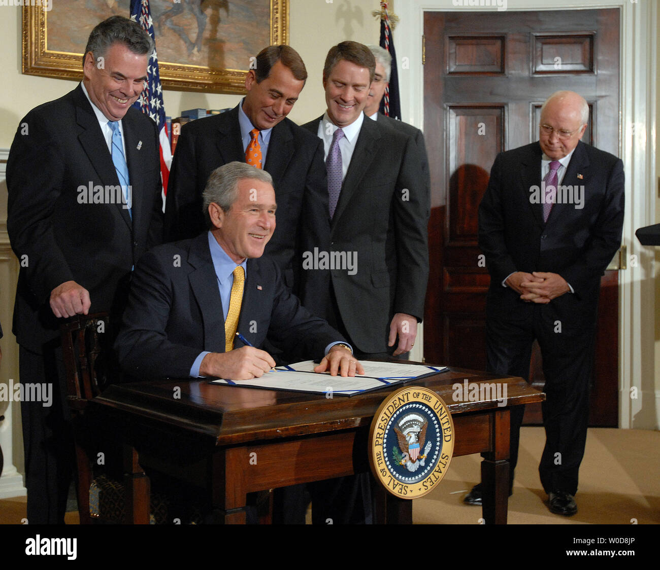 U.S. President George W. Bush signs the Secure Fence Act of 2006 ...