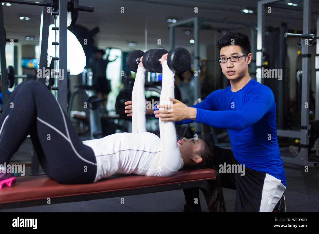 young asian people working out in modern gym Stock Photo - Alamy