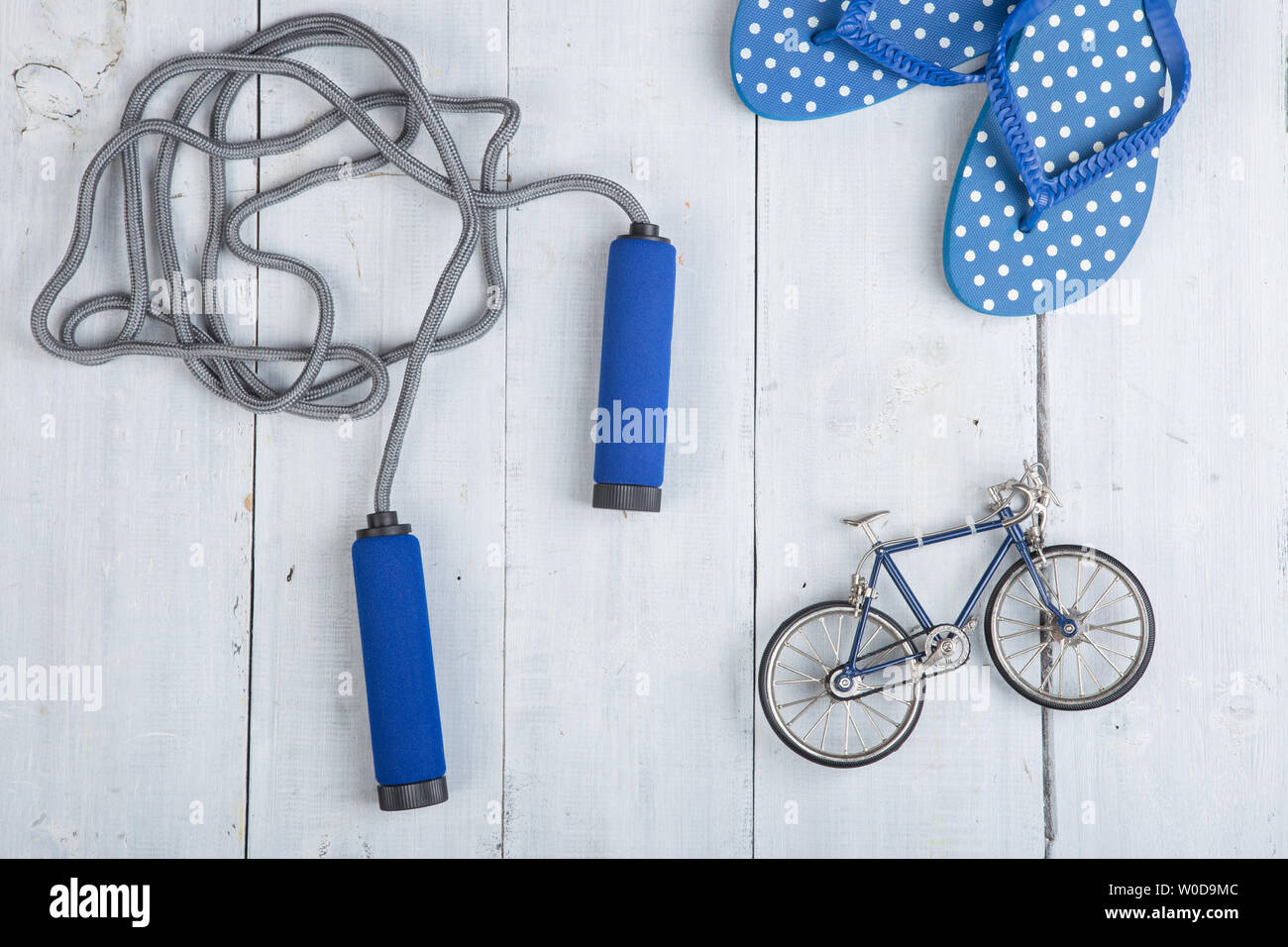 Fitness/sport and healthy lifestyle concept - Jumping/skipping rope ...