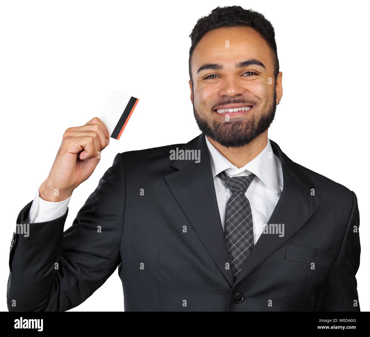 Happy smiling young man holding a credit card isolated on white ...