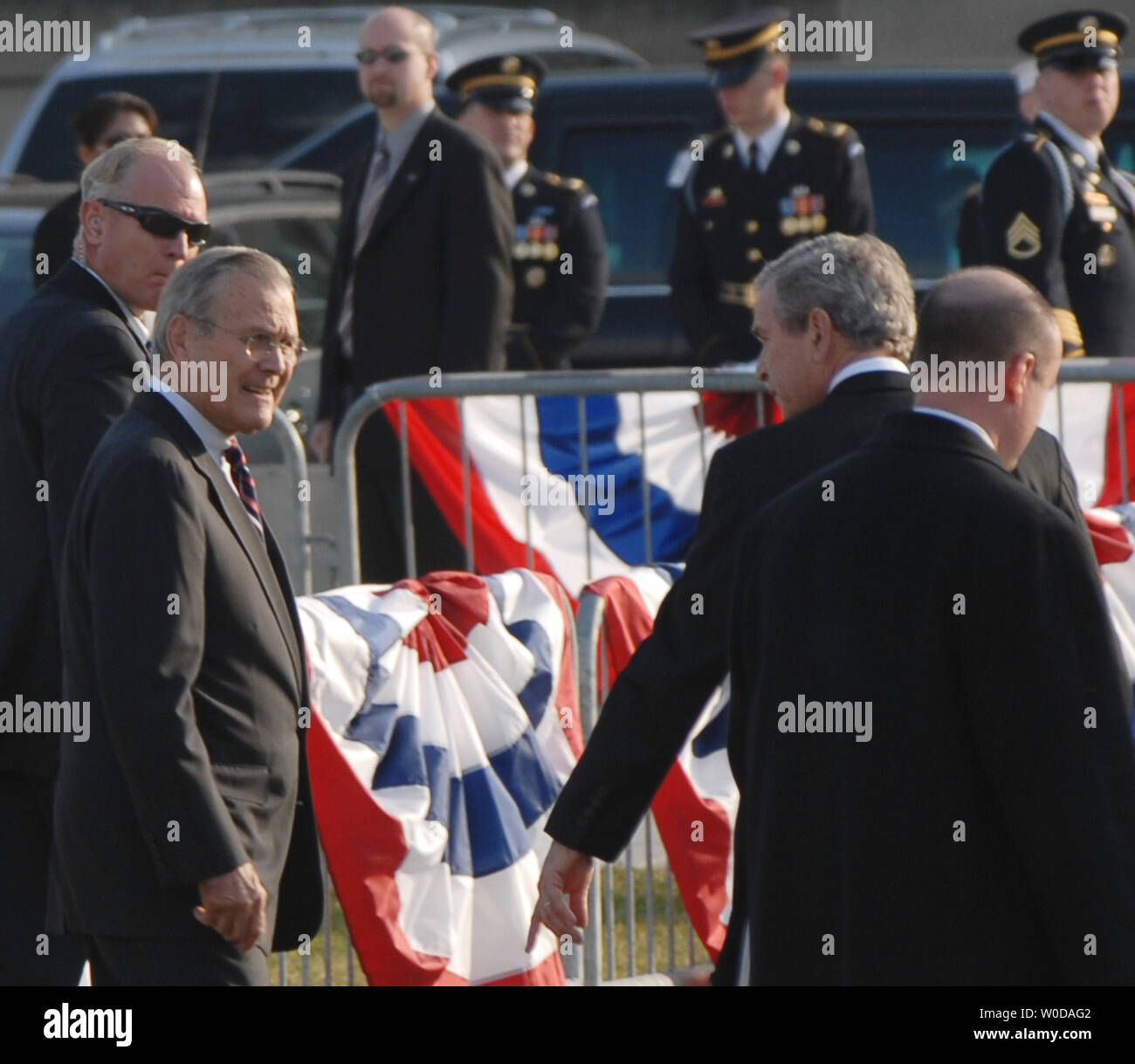 Outgoing Secretary of Defense Donald Rumsfeld (L) and U.S. President ...