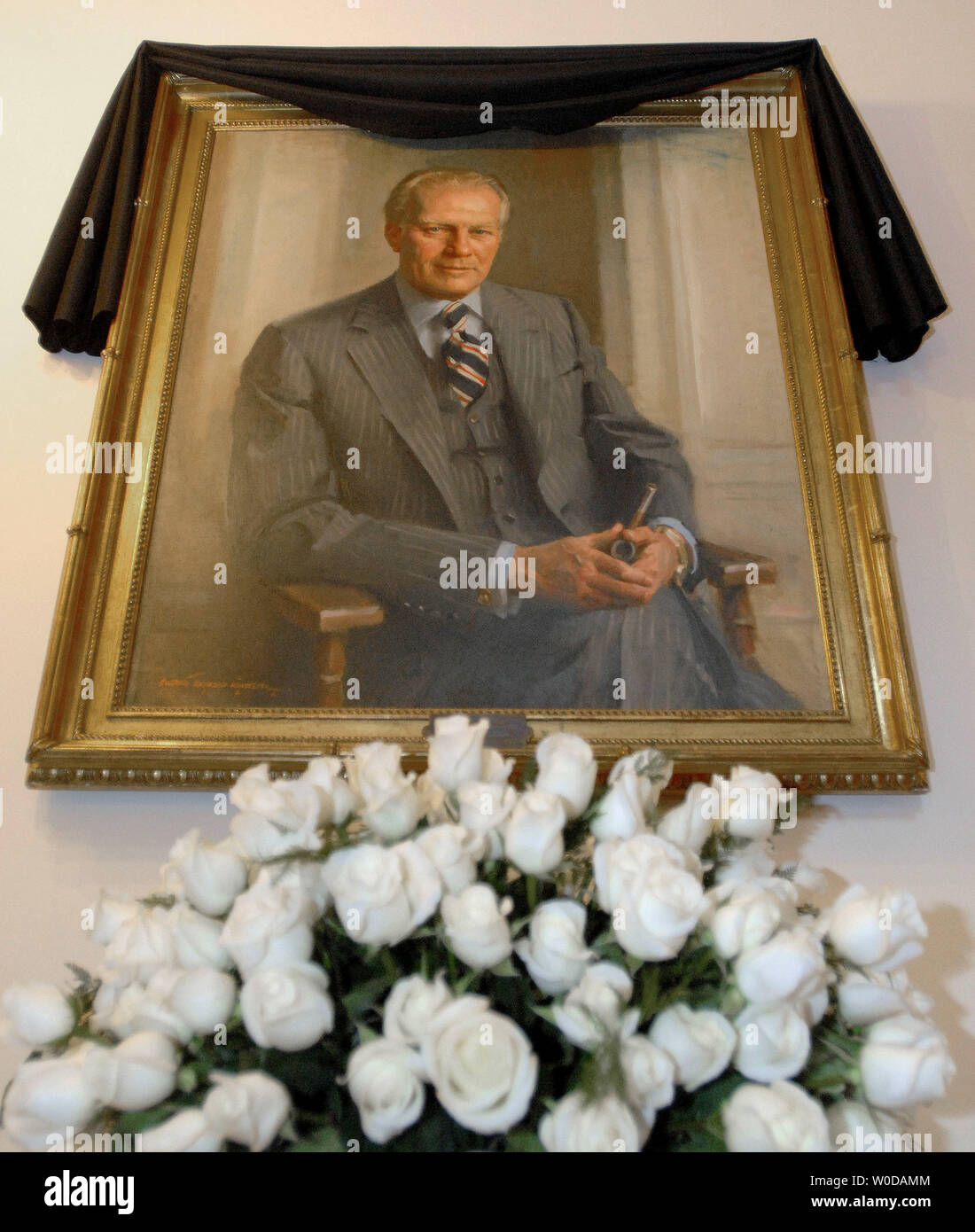 Former President Gerald R. Ford's portrait is draped in black and ...