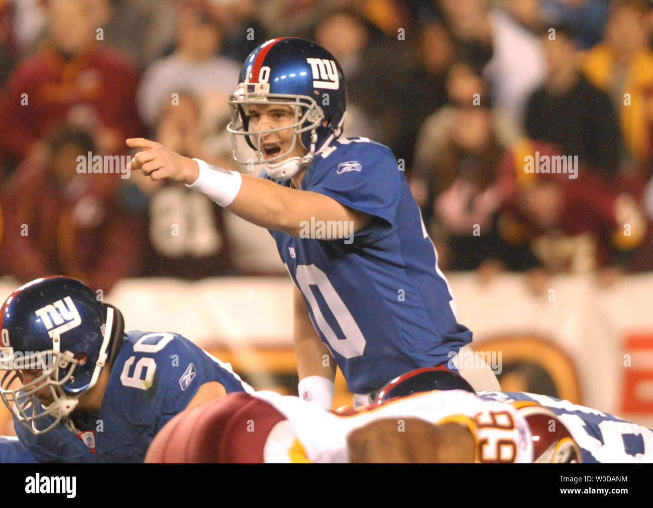 The New York Giant's Eli Manning calls out a play in the first quarter ...