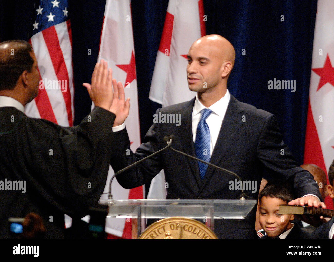 D.C. Mayor Adrian Fenty (R) is sworn into office by Chief Justice Eric ...