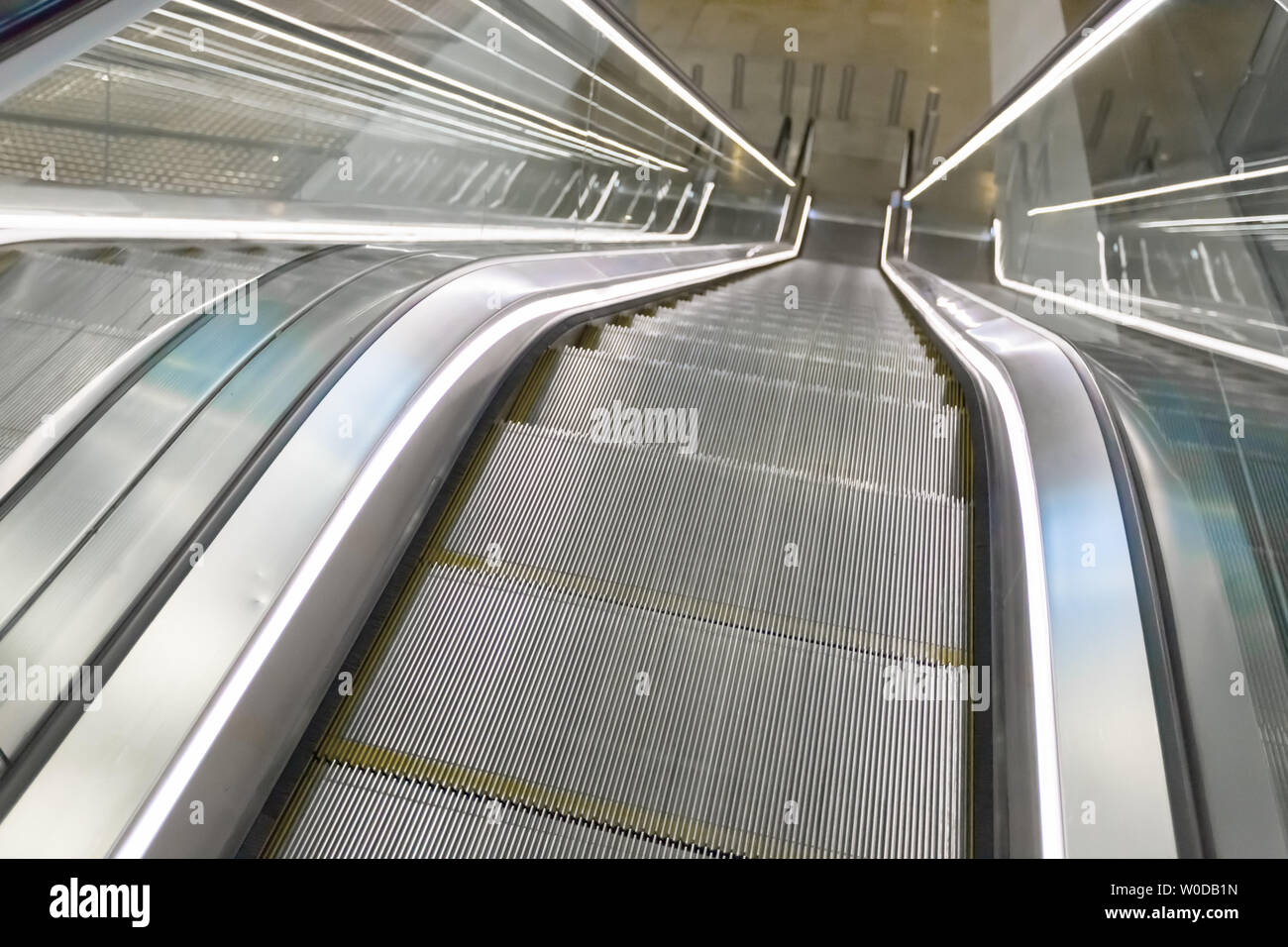 Modern escalator electronic system moving Stock Photo - Alamy