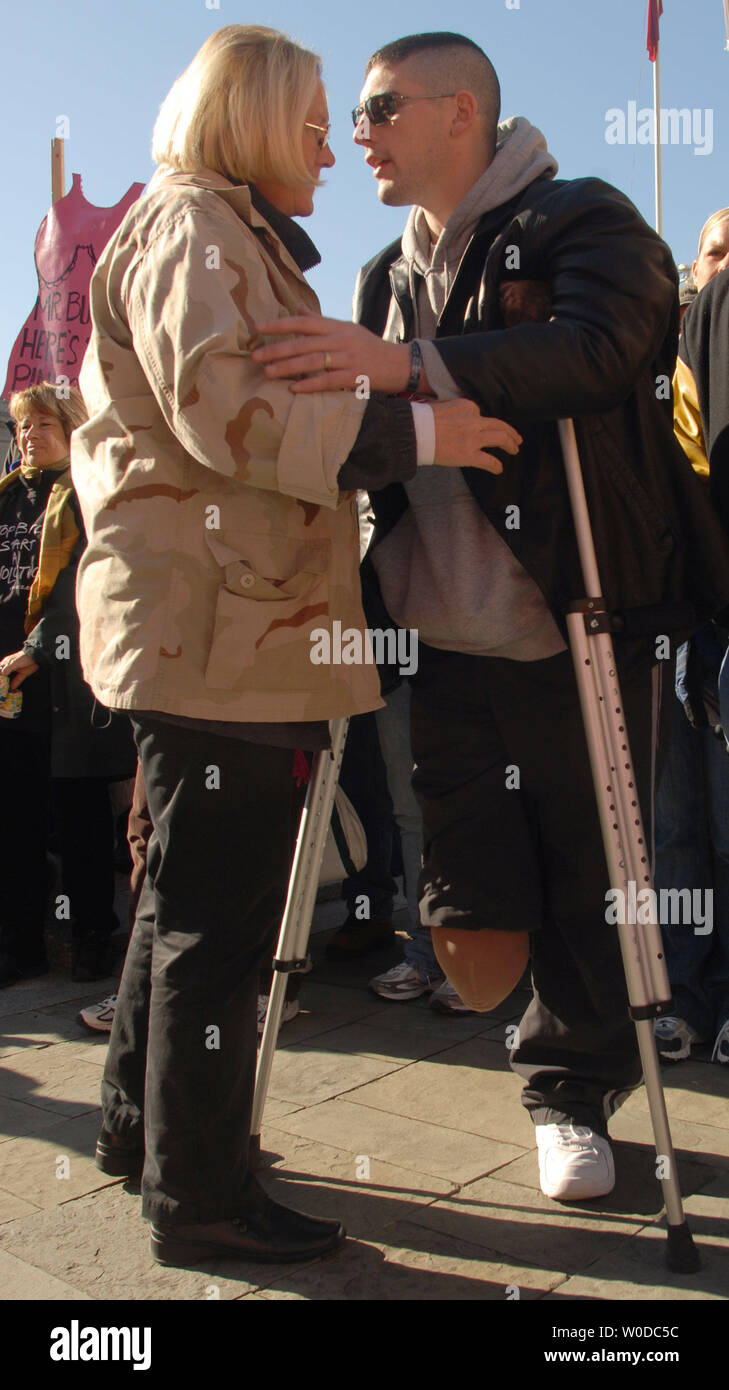 Retired Army Col. Ann Wright speaks with Col. Joshua Spaulding, who ...