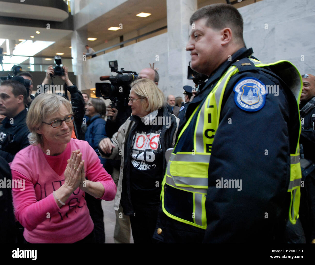 Arresting office hi-res stock photography and images - Alamy