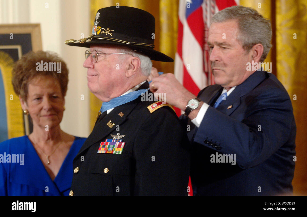 President George W. Bush awards the Medal of Honor to Retired Army Lt ...
