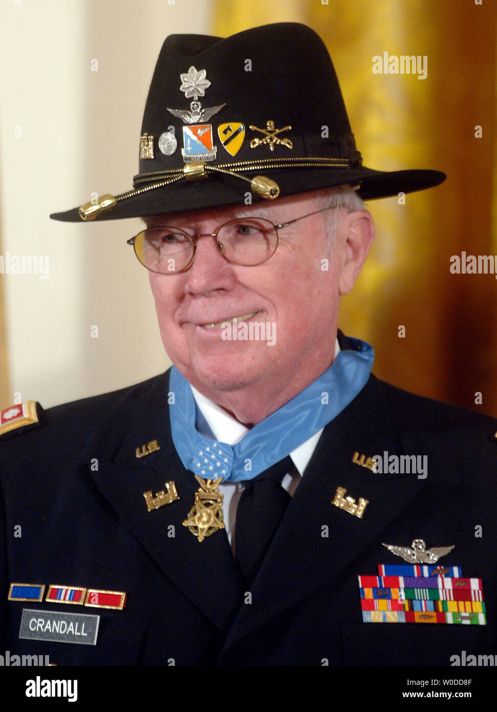 Retired Army Lt. Col. Bruce Crandall stands after receiving the Medal ...