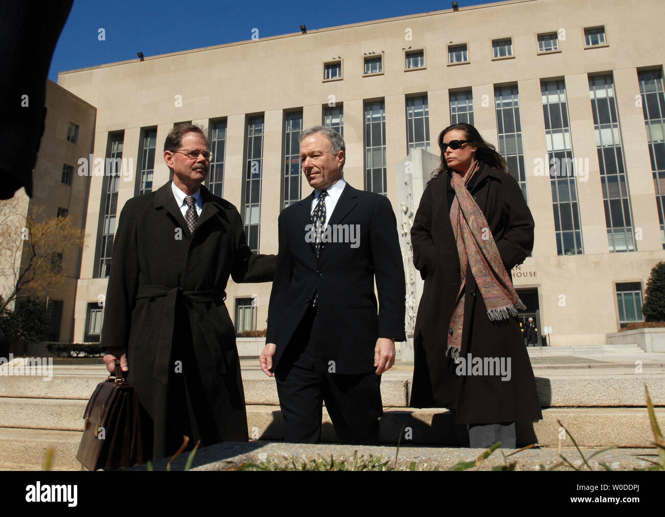 Former White House aide I. Lewis 'Scooter' Libby (C), accompanied by ...