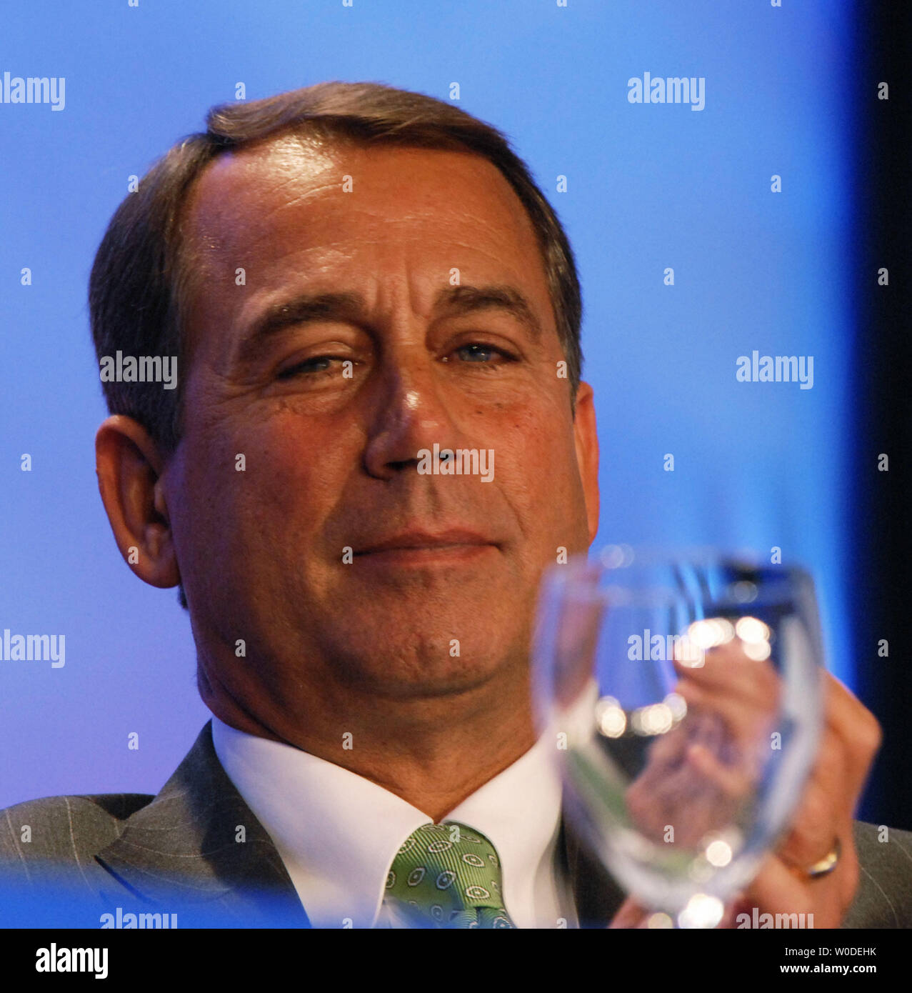 House Minority Leader John Boehner (R-OH) listens to U.S. President ...