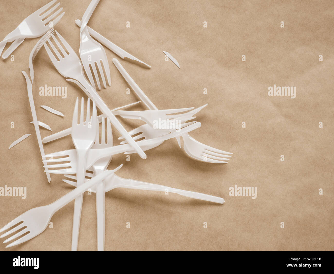 Plastic forks garbage on light background. Plastic free concept Stock ...