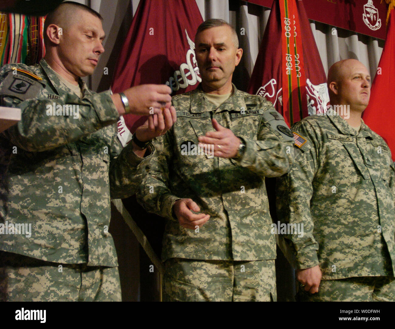 Command Sergeant Major Jeffrey Hartless (L) hands Brigadier Gen ...